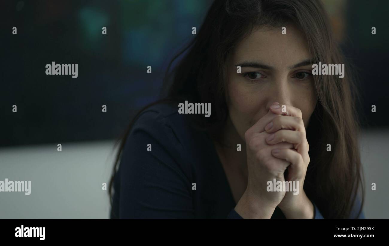 Fearful woman suffering emotional problems. One worried girl closing ...