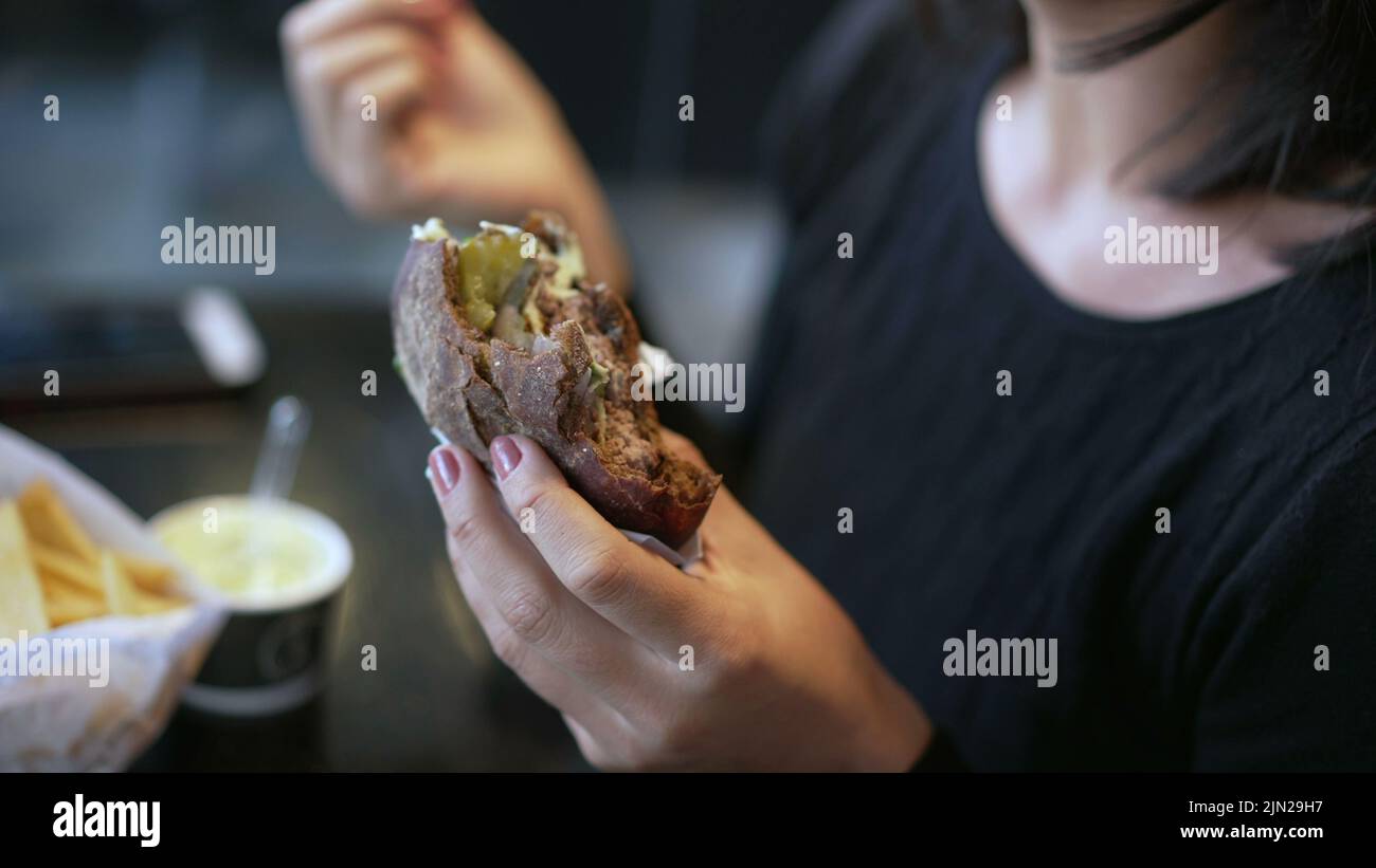 Half eaten sandwich hand hi-res stock photography and images - Alamy