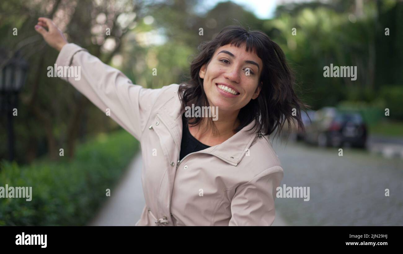 Carefree woman jumping with joy enjoying life. Female person ...