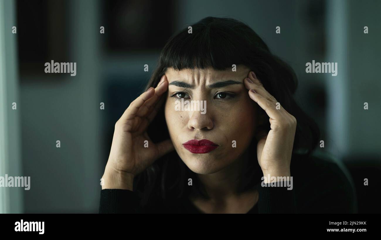 Confused millennial girl suffering. Fearful woman with preoccupied ...
