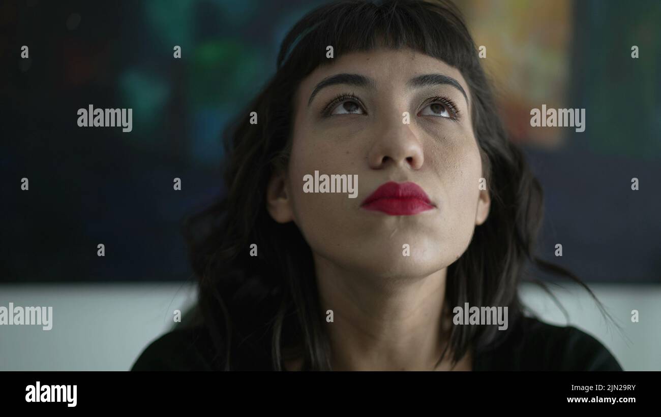 One anxious latina girl feeling apprehension. Concerned young restless ...