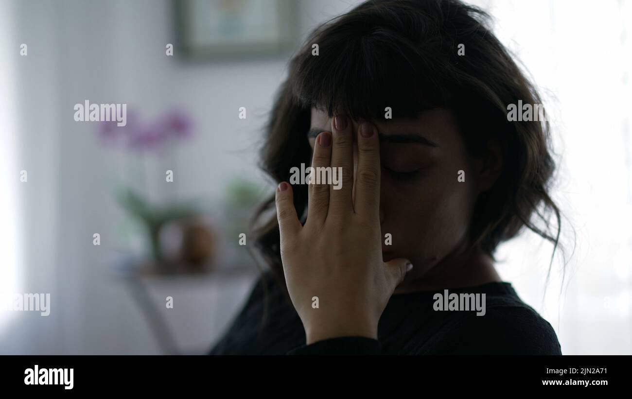 Young woman feeling regret. One hispanic girl feeling regretful emotion ...