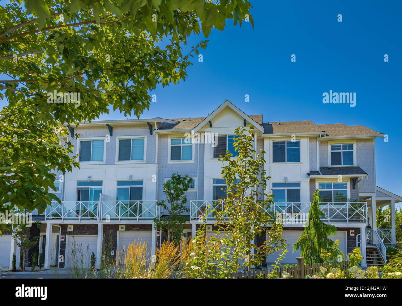 Neighborhood new modern houses building in BC, Canada. Canadian modern ...
