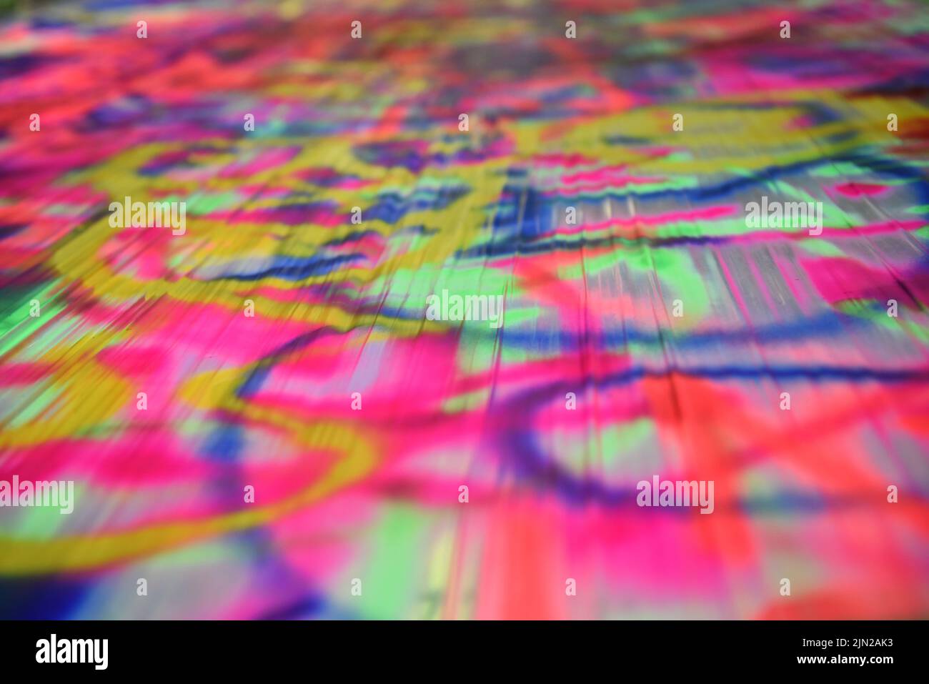 Children's drawings and coloring with paints on plastic wrapping paper ...