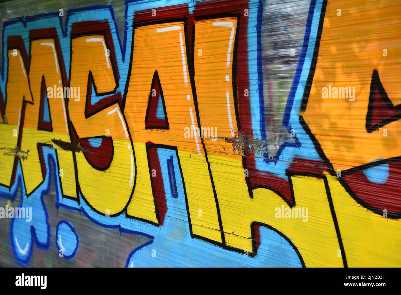 Children's drawings and coloring with paints on plastic wrapping paper ...