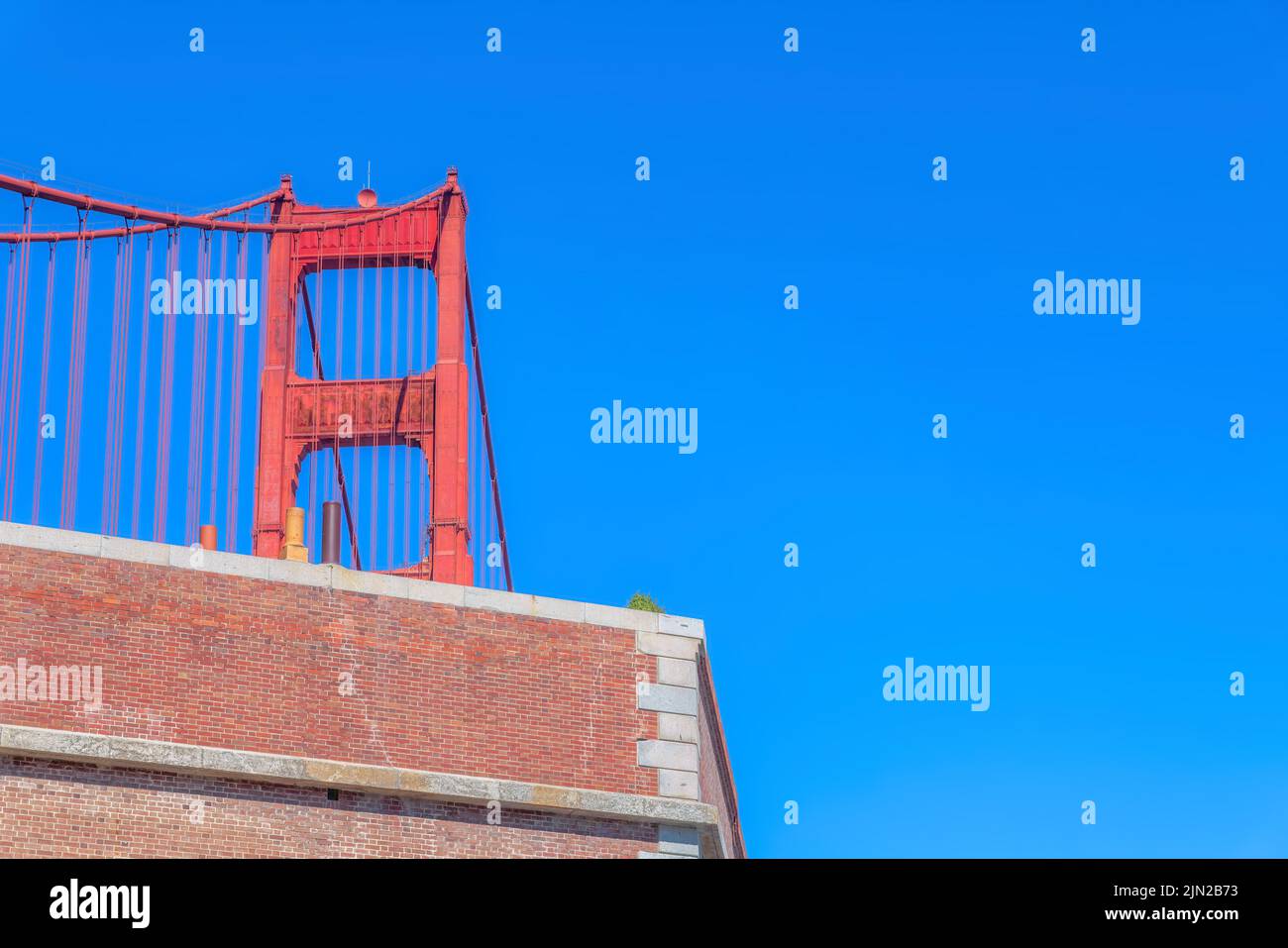 View of the Golden Gate Bridge tower from below at San Francisco ...