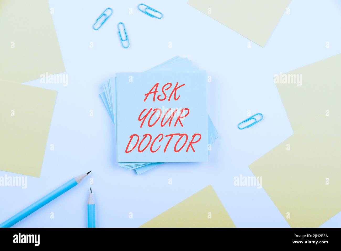 Hand writing sign Ask Your Doctor. Concept meaning Consultation to ...