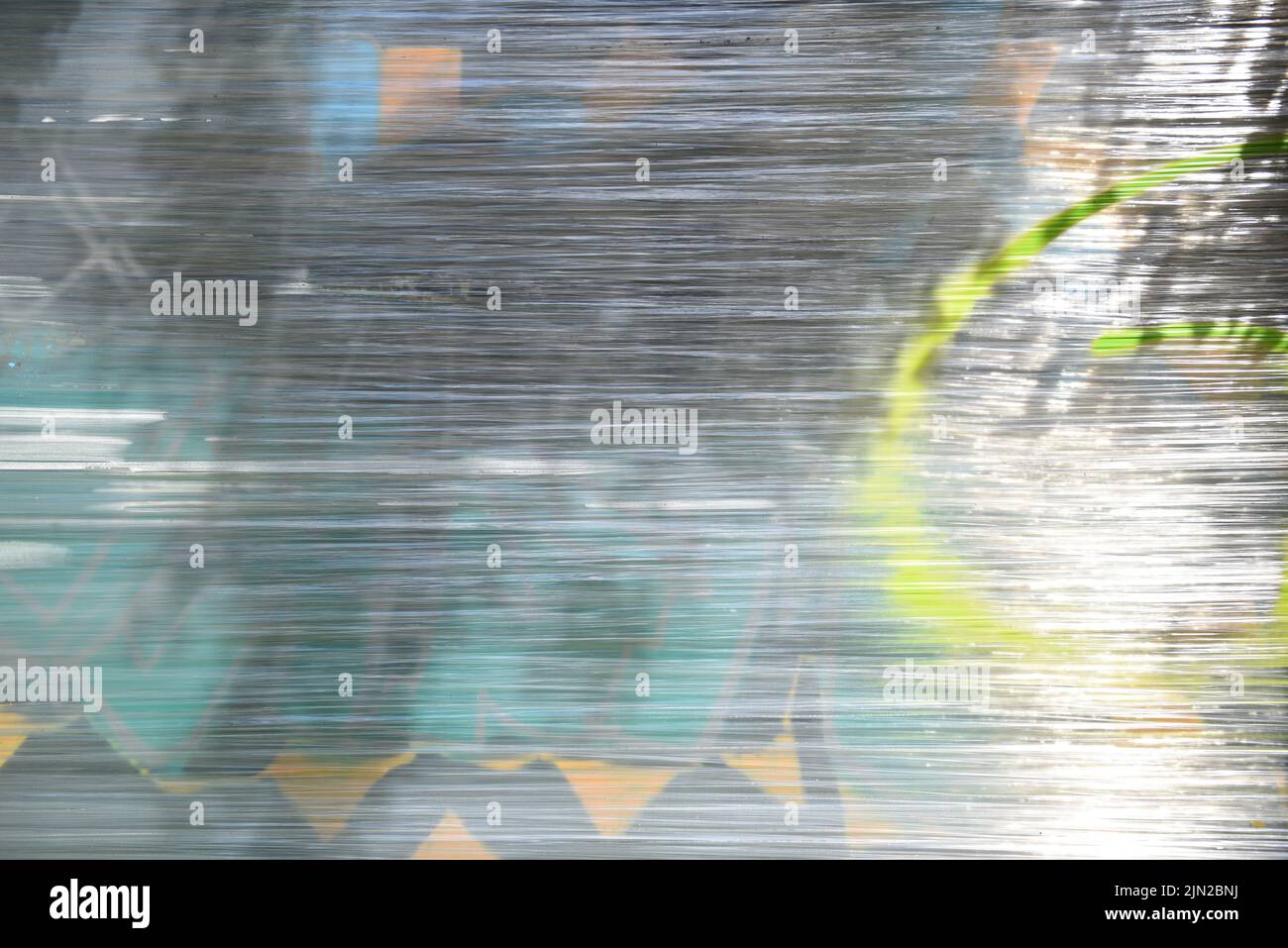 Children's drawings and coloring with paints on plastic wrapping paper ...