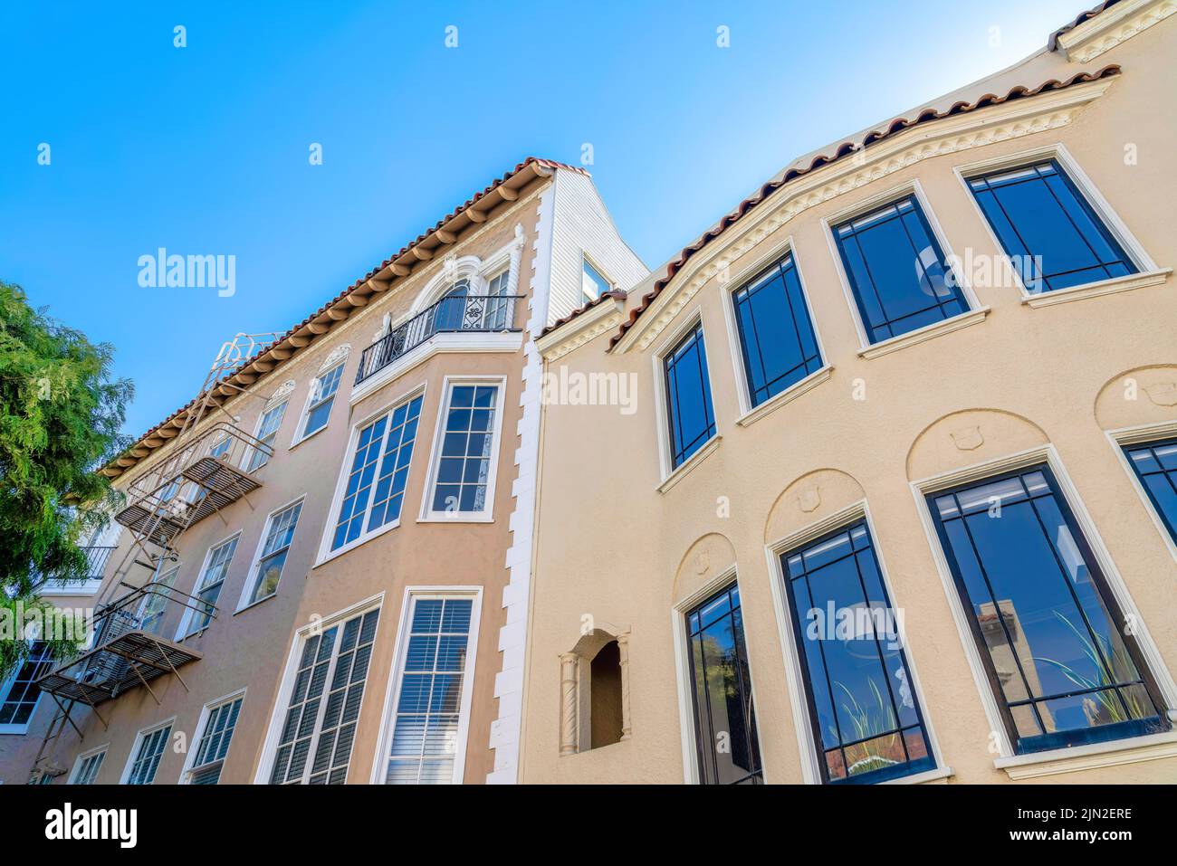 Adjacent italianate residential buildings at San Francisco, CA. There ...