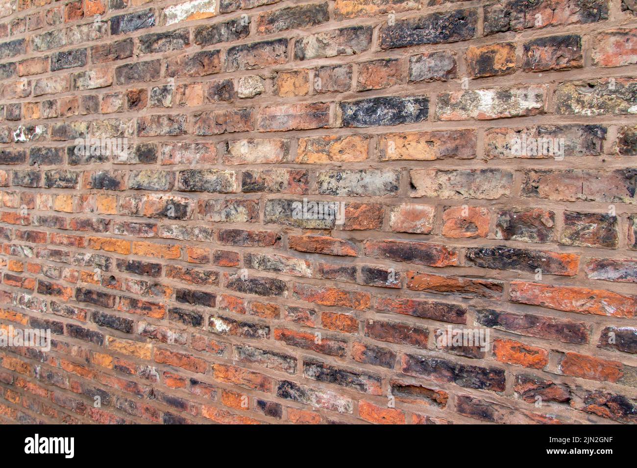 Full frame texture background of an old European red and brown brick ...
