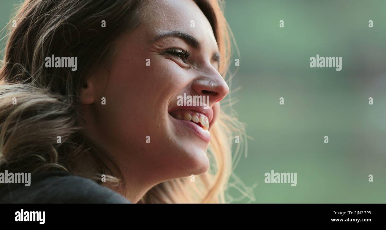 Young woman spontaneous real life laugh. Authentic candid girl acting ...