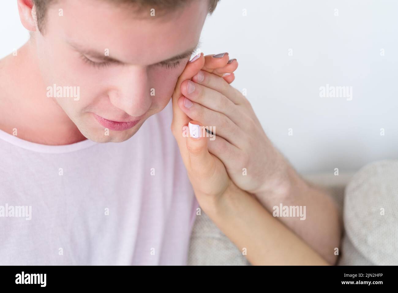 man hold hand love bond nonverbal communication Stock Photo - Alamy