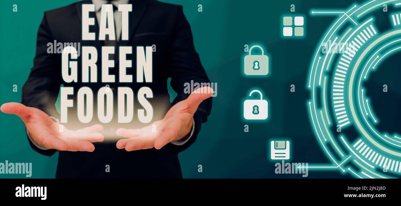 Hand writing sign Eat Green Foods. Business approach Eating more ...