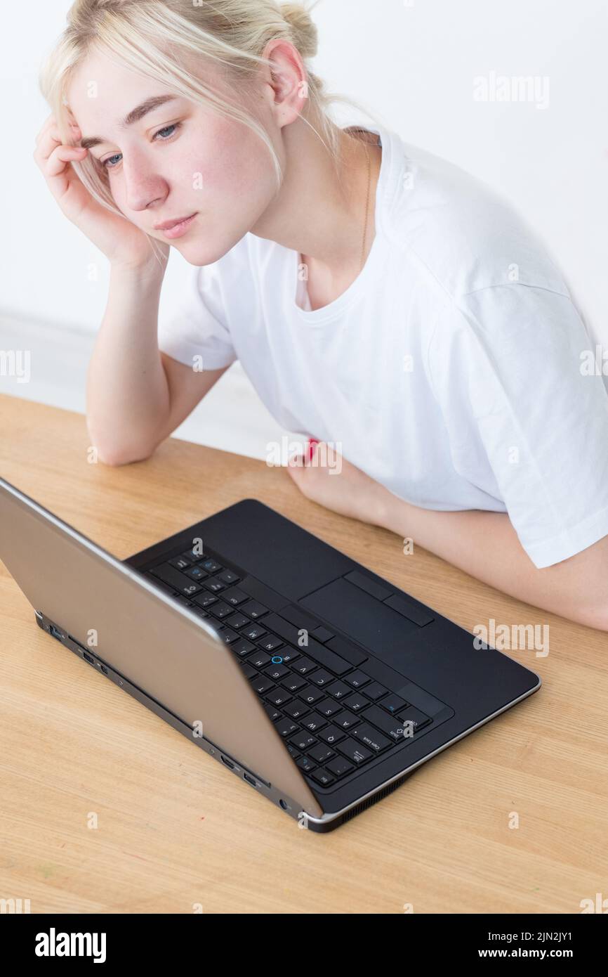 pensive woman laptop writer block inspiration Stock Photo - Alamy