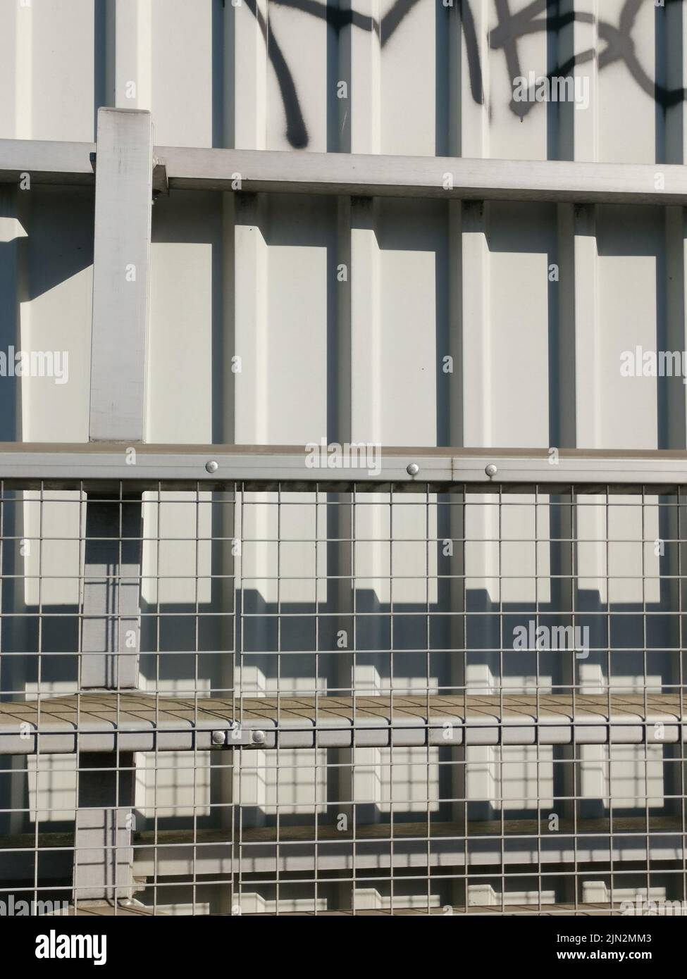 Vertical image of various types of grey metal netting and fencing Stock ...