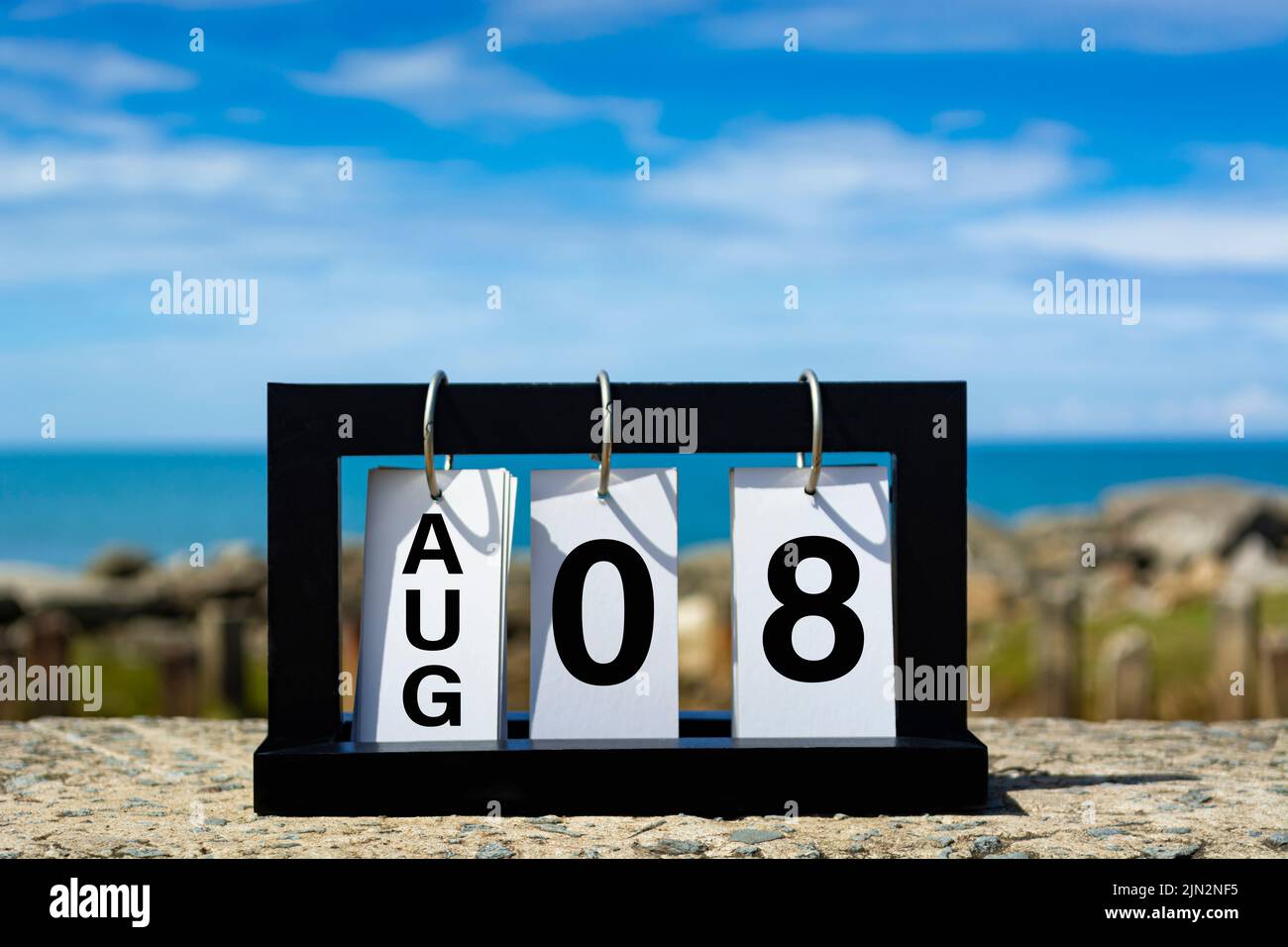Aug 08 calendar date text on wooden frame with blurred background of ...
