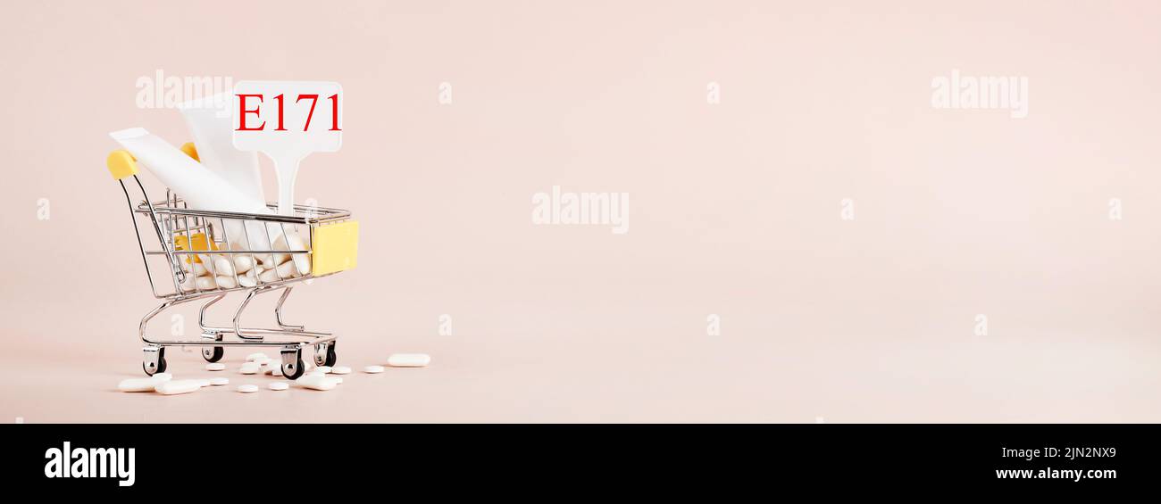 Titanium dioxide, E171, dangerous additive concept. gum, pills ...