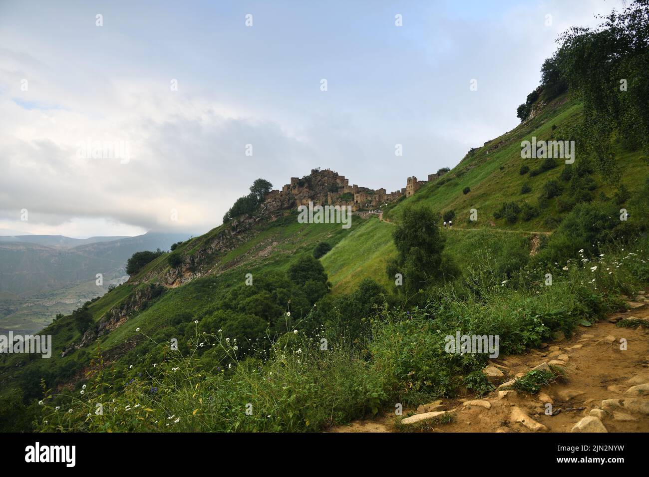 Ancient village Gamsutl on rock on background of mountains. Amazing ...