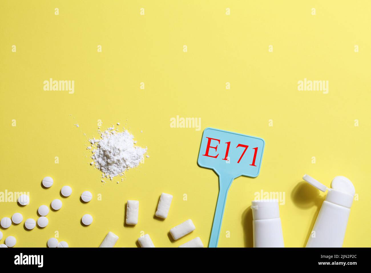 Titanium dioxide, E171, dangerous additive concept. gum, pills ...