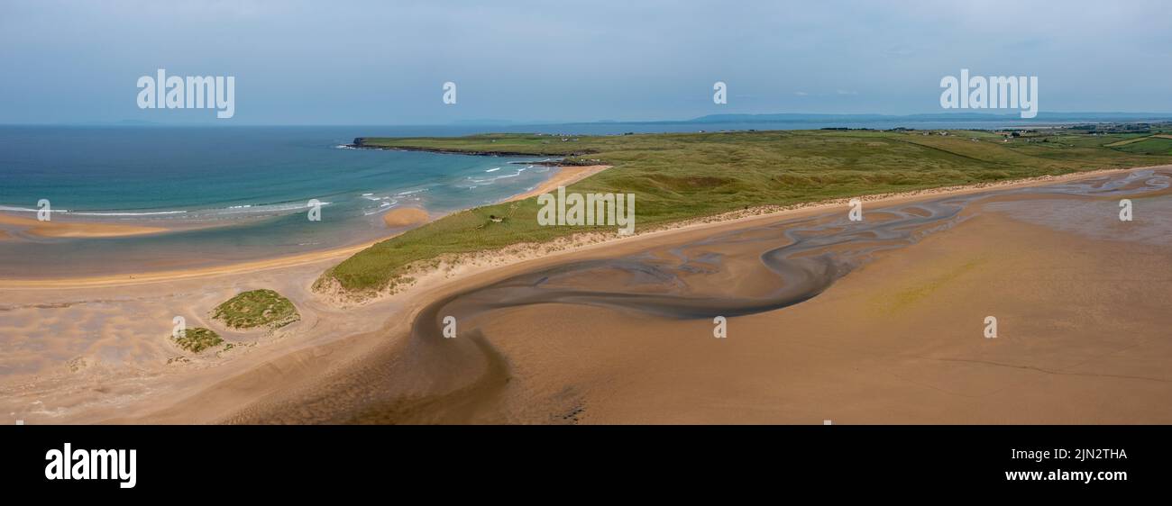A panorama drone landscape view of the beautiful golden sand beach at ...