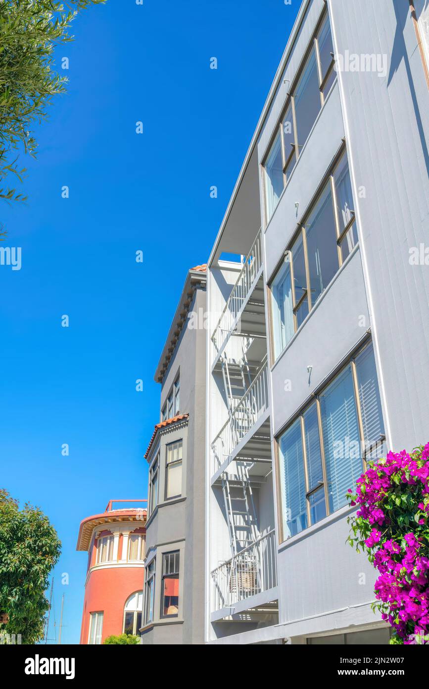Modern low-rise apartment buildings in a low angle view at San ...