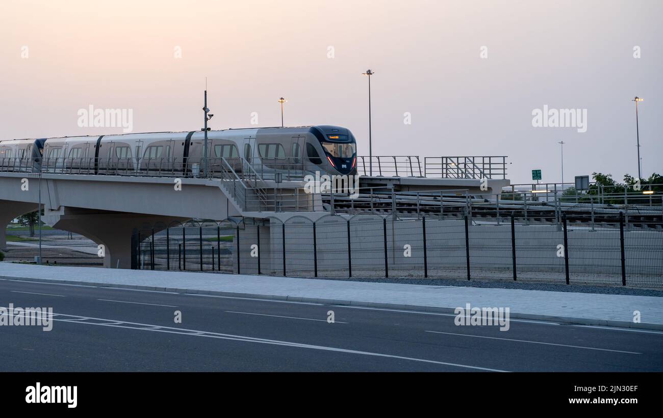 Doha, Qatar- June 06,2022 :Qatar red line metro traveling through the ...