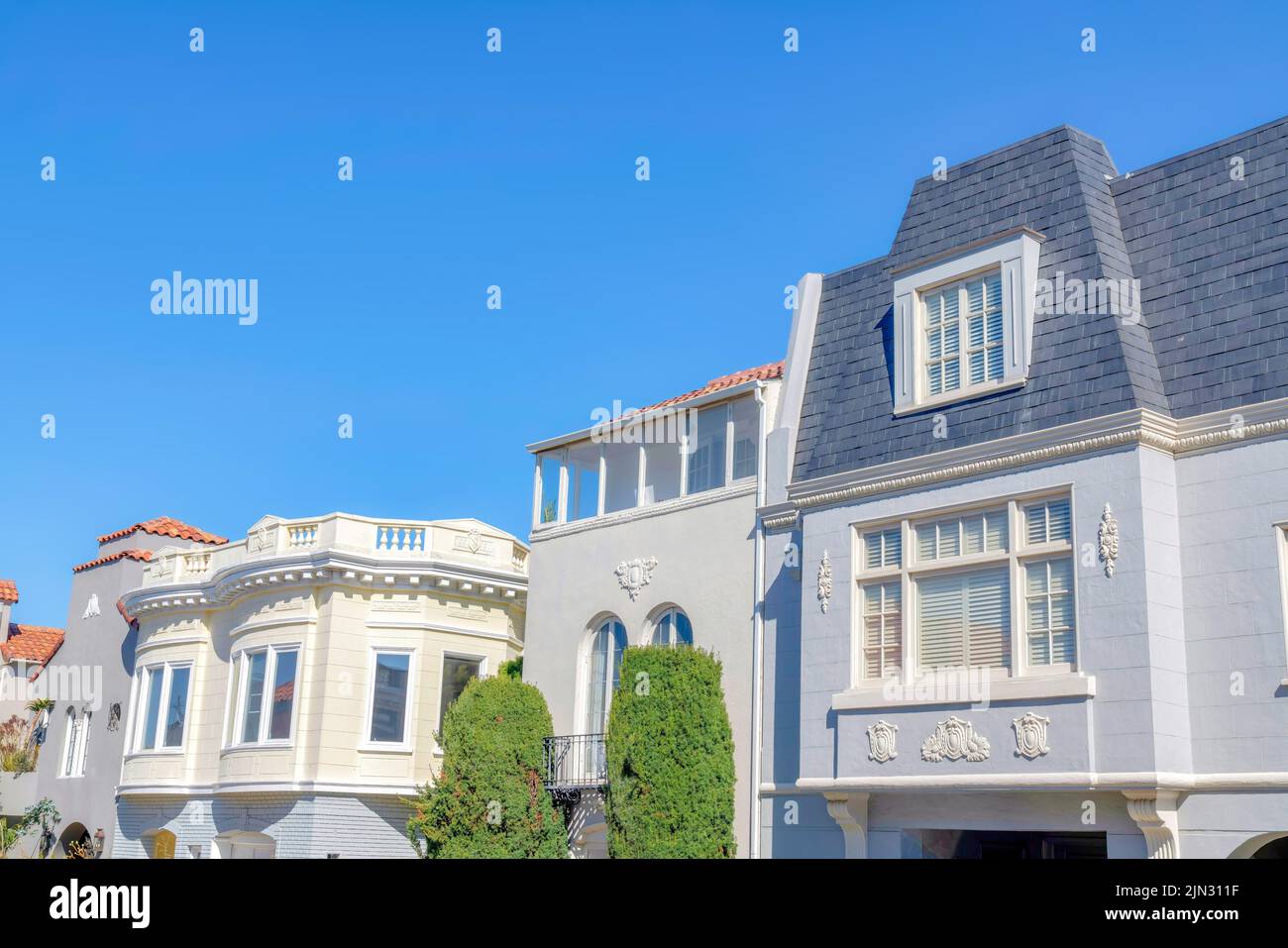Row of houses with decorative wall exterior at San Francisco ...