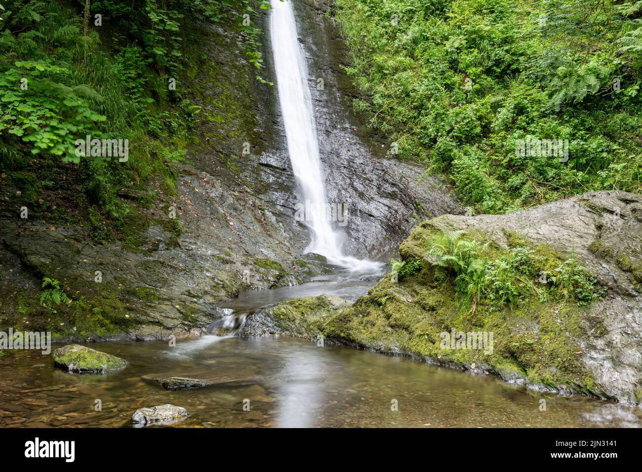 Long exposure of the White Lady waterfall on the river Lyd at Lyford Gorge in Devon Stock Photo ...