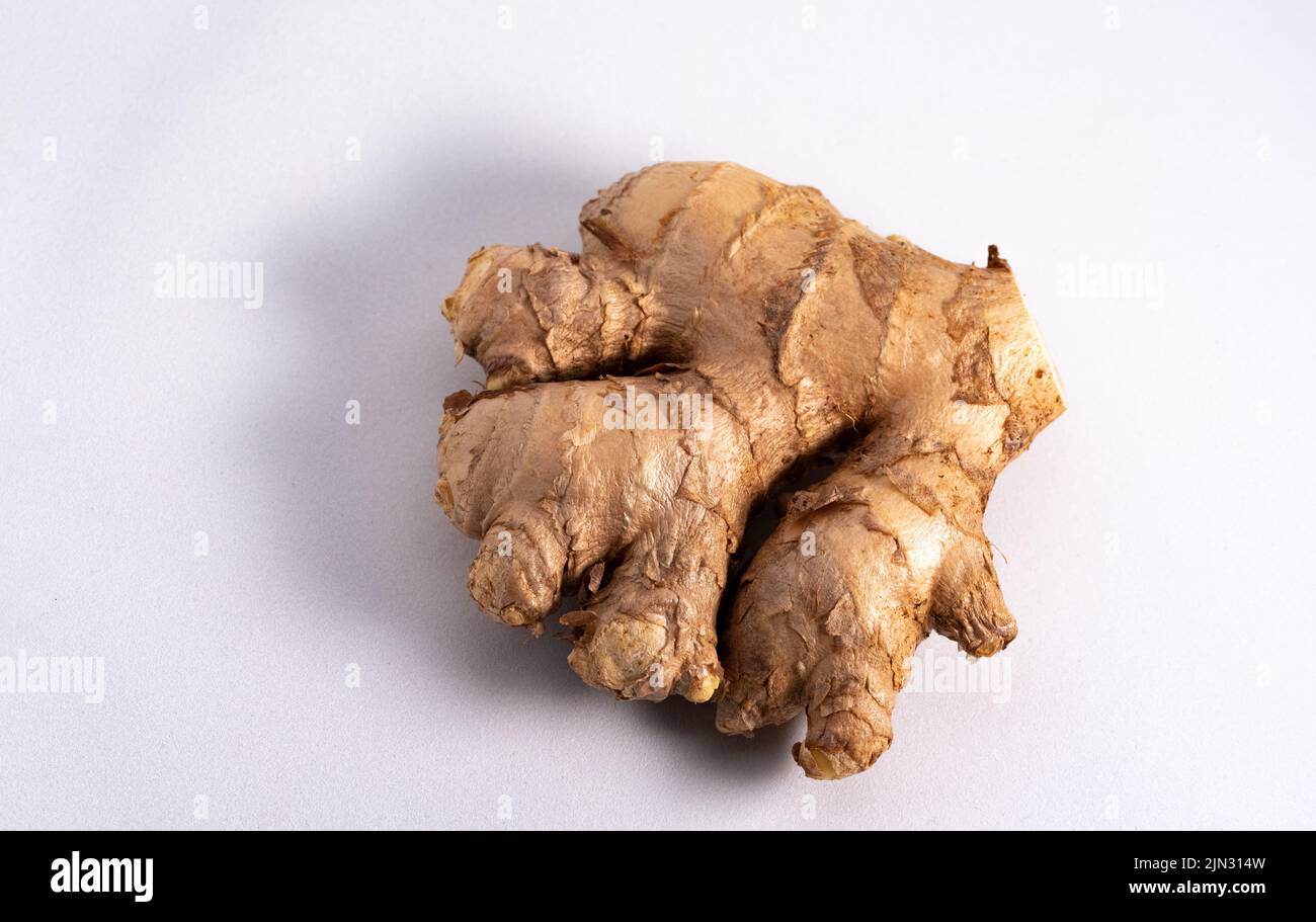 Ginger isolated on a white background. Ginger root close-up. The root ...