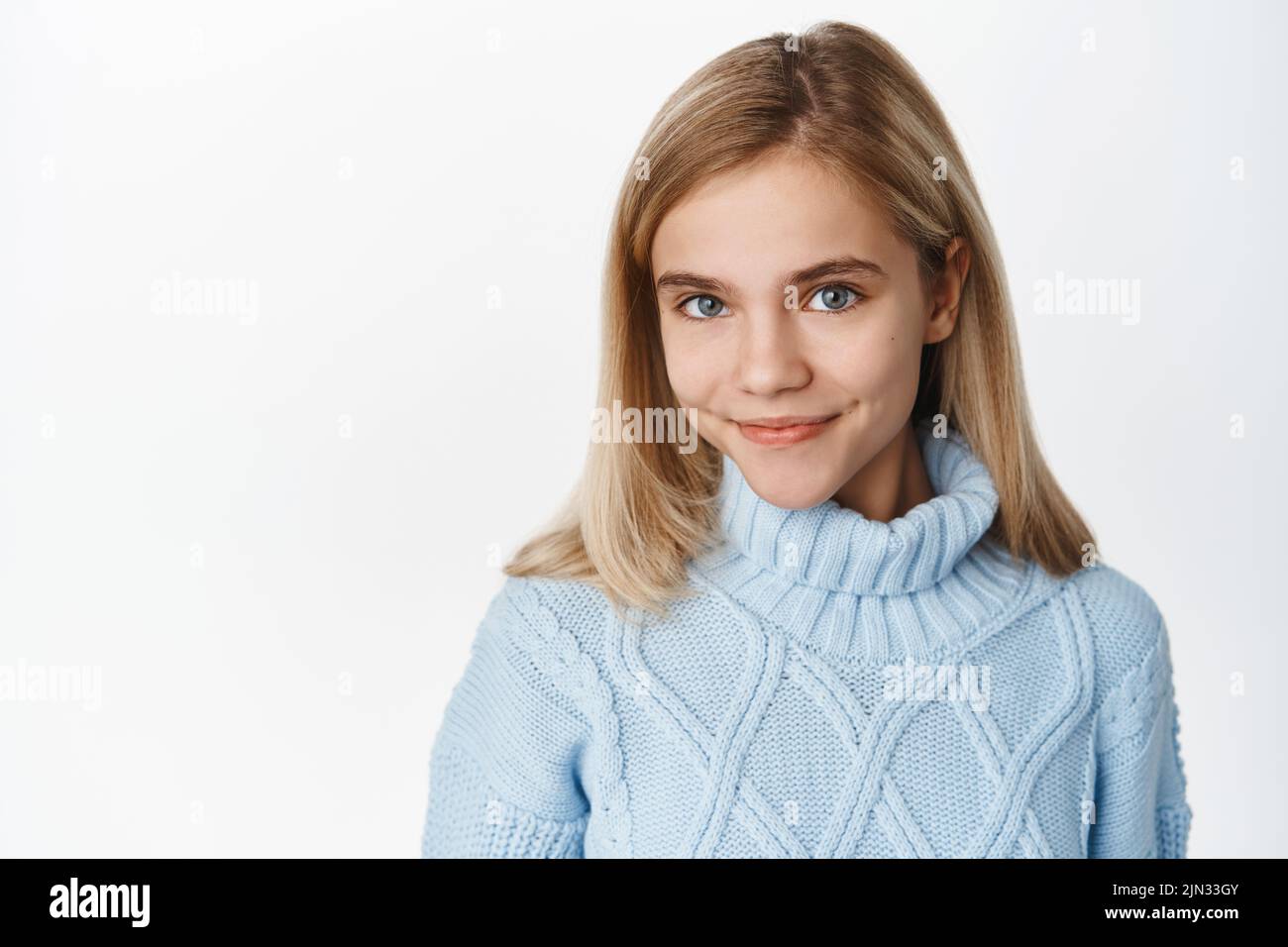 Close up portrait of stylish modern little girl, child in winter ...