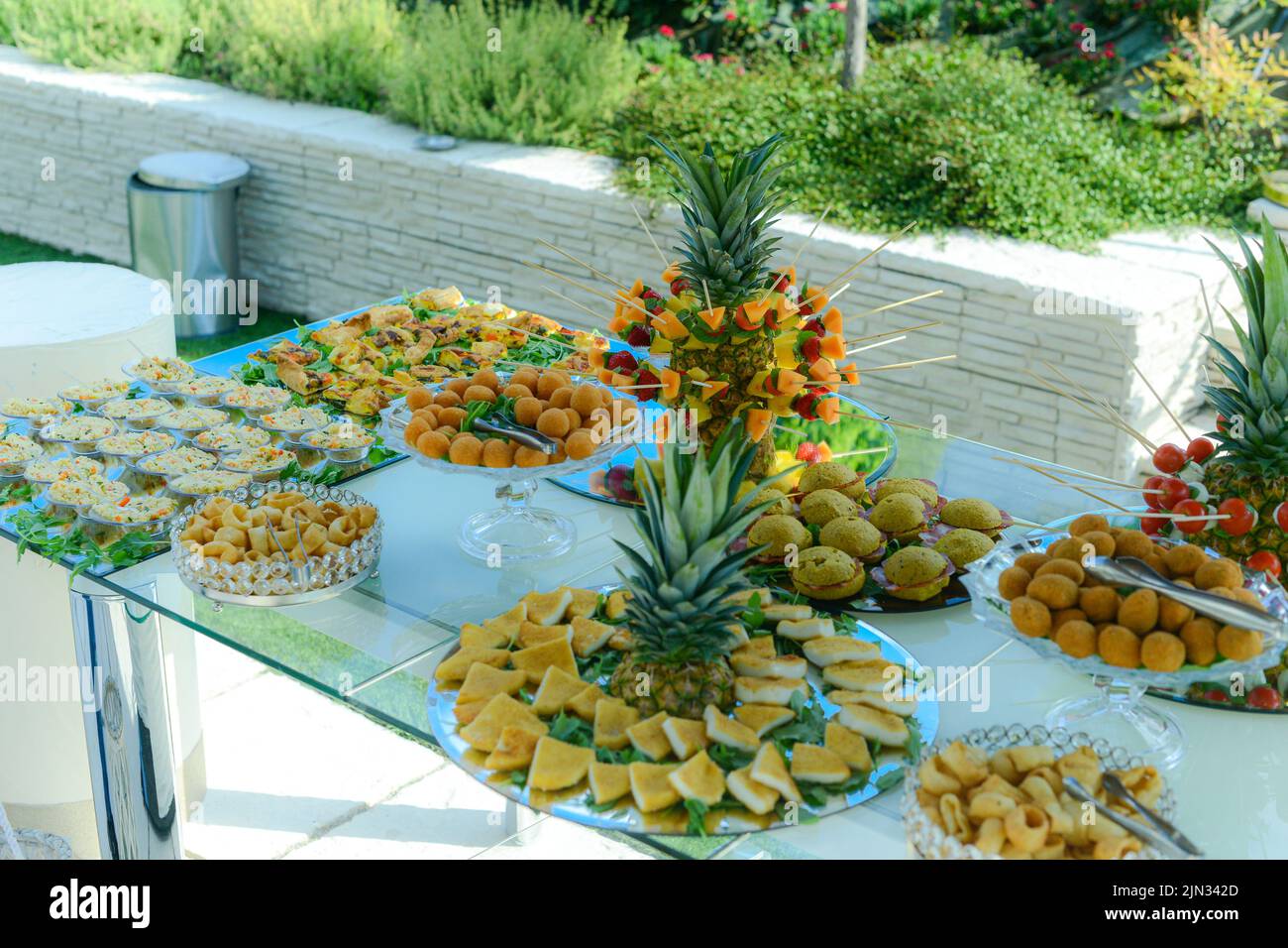 The garden table in the garden set with an assortment of Italian ...
