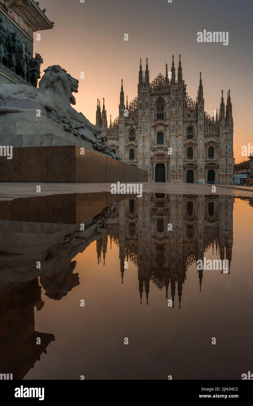 Sunset Scene of The ornate gothic facade, soaring spires and ...