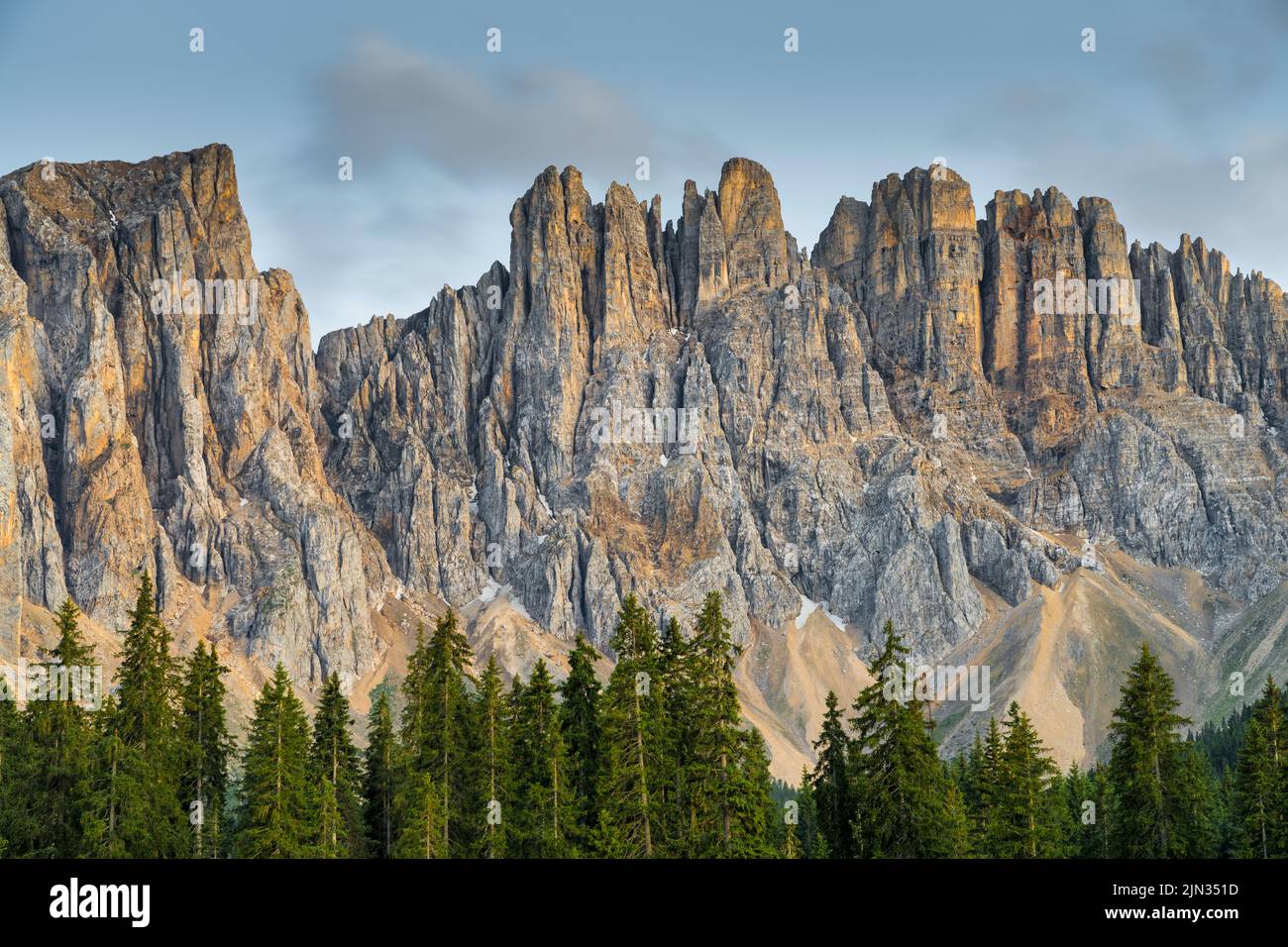 Italian alps. Silent morning on the lake of Carezza surrounded by pine ...
