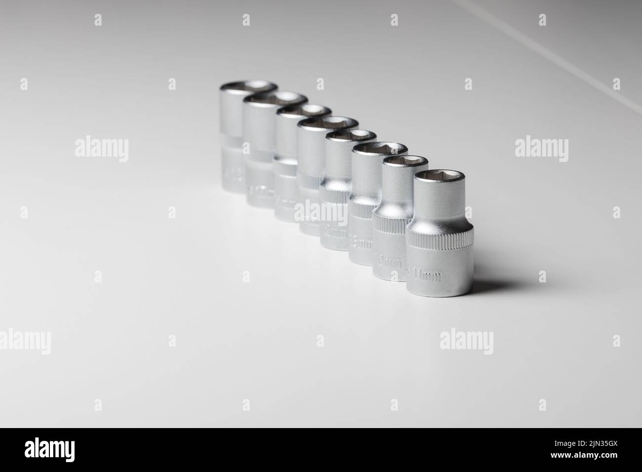 Eight socket wrenches isolated on a white background Stock Photo - Alamy