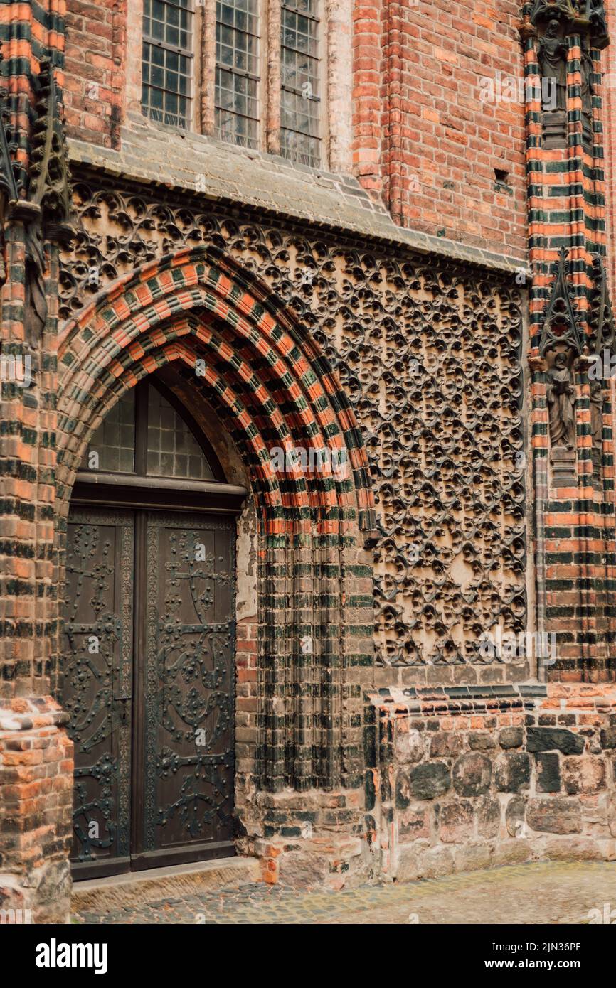 Entrance to the old European Catholic Church. Ancient architecture ...
