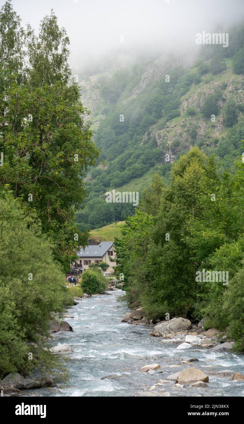 mountain water river flowing through the valley, Cirque de Gavarnie ...