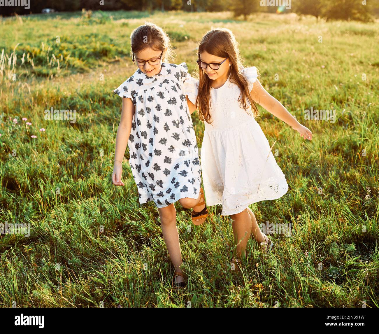 child summer fun lifestyle sister friend outdoor girl field friendship ...