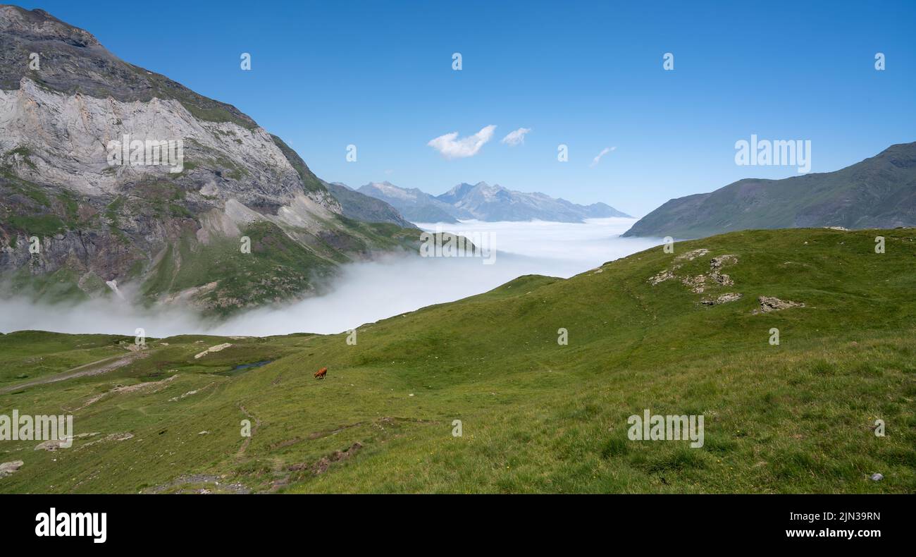 enourmous circular valley surrounded by tall mountains, the Cirque de ...