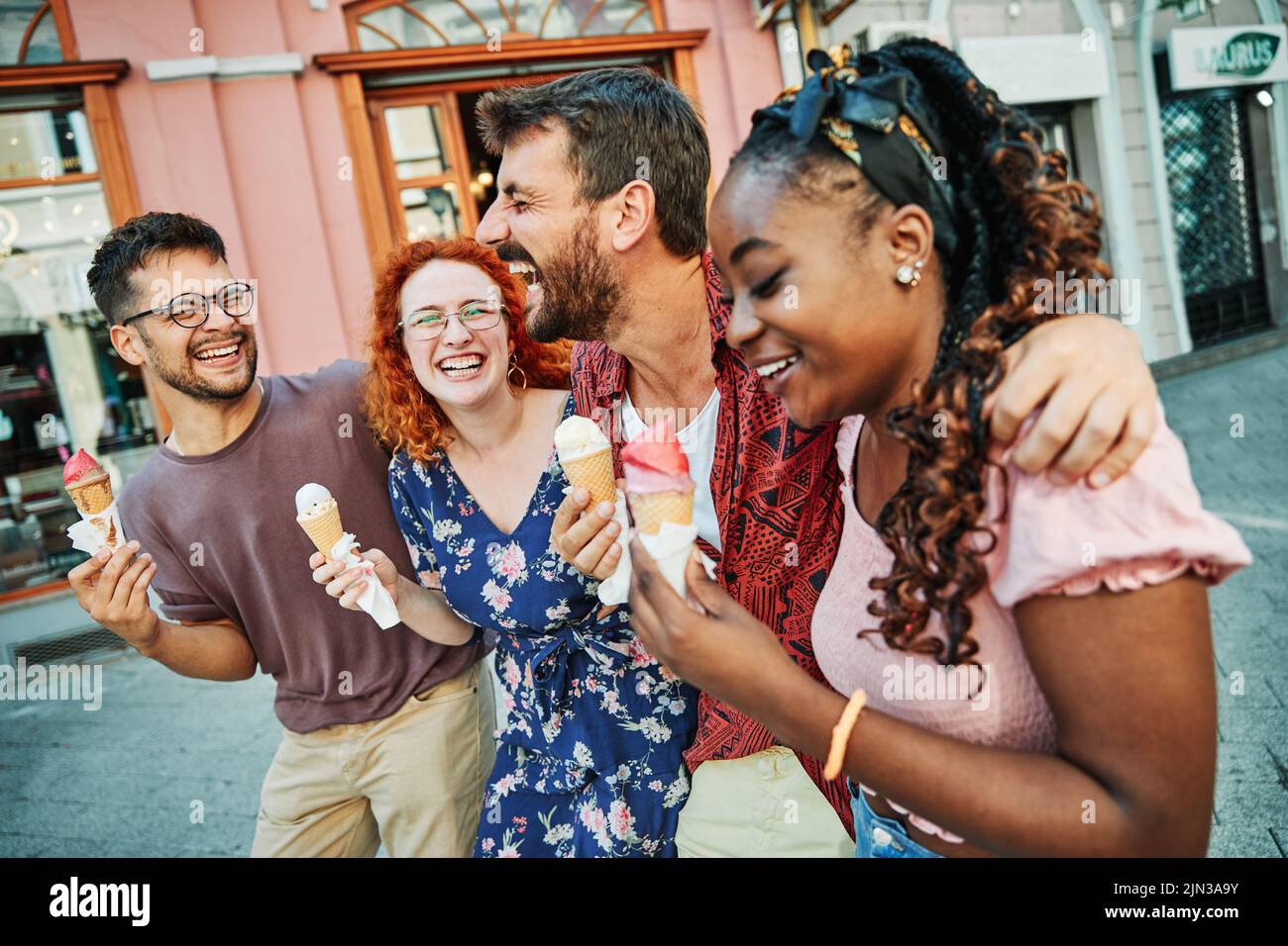 To people walking eating icecream hi-res stock photography and images - Alamy