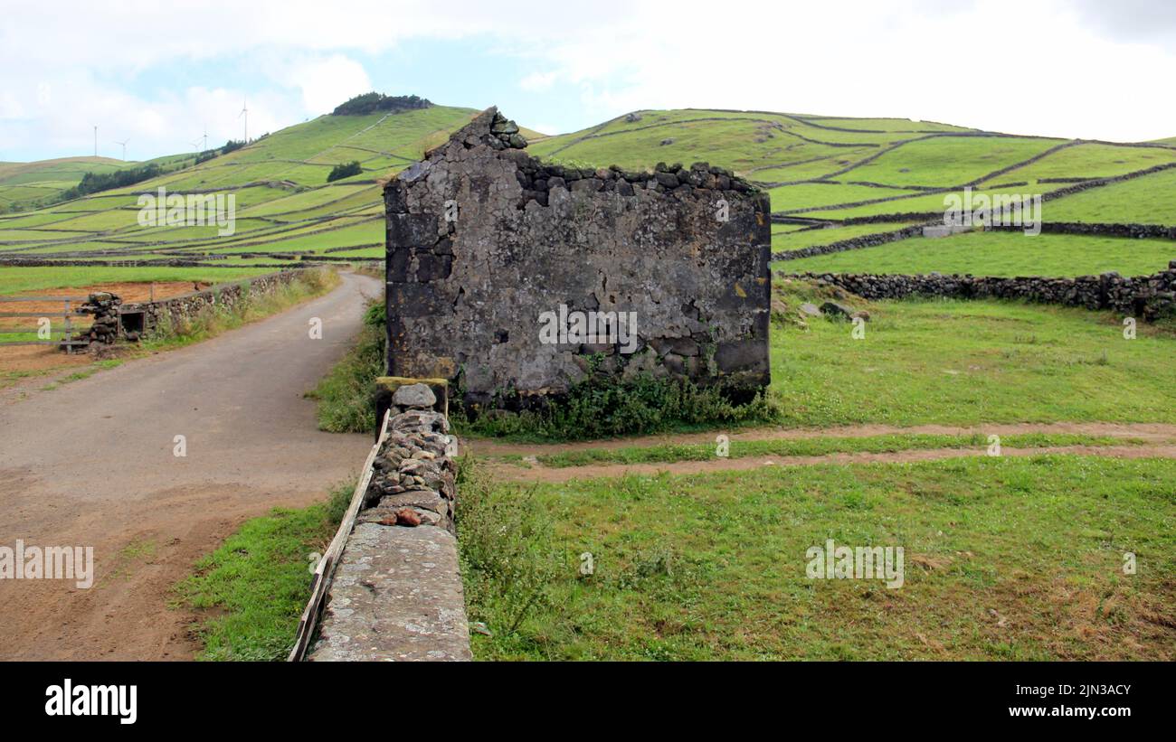 Rural landscape with stone fence and a ruin, on Terceira Island, Azores ...