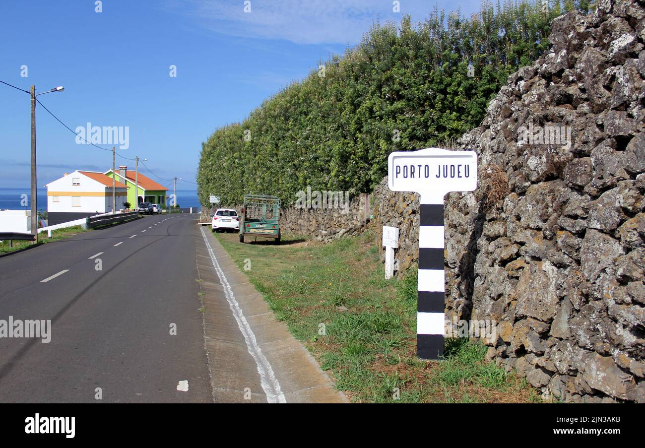Road sign at the entrance to the town of Porto Judeu, Terceira, Azores ...