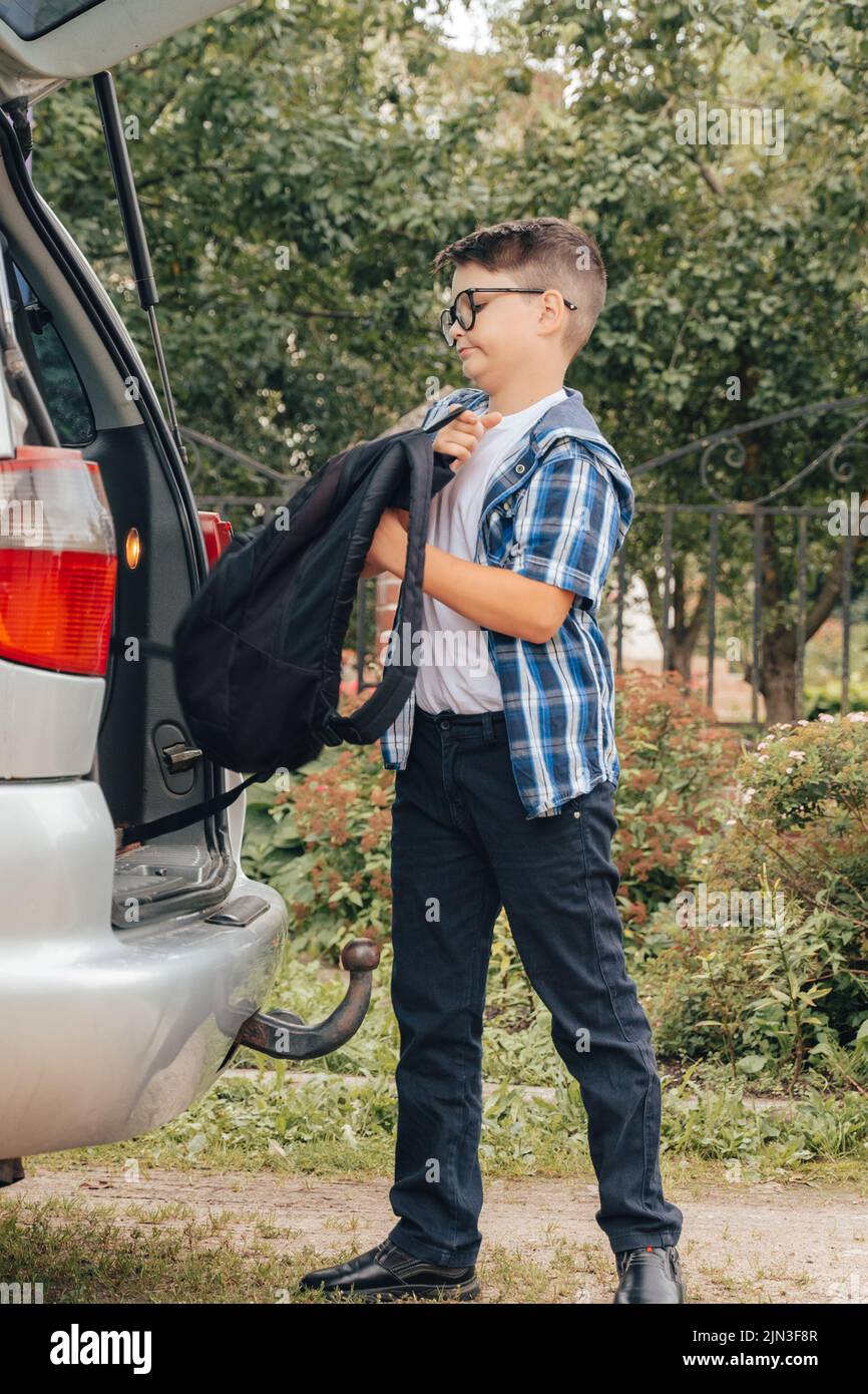 Sad teen boy inside car hi-res stock photography and images - Alamy