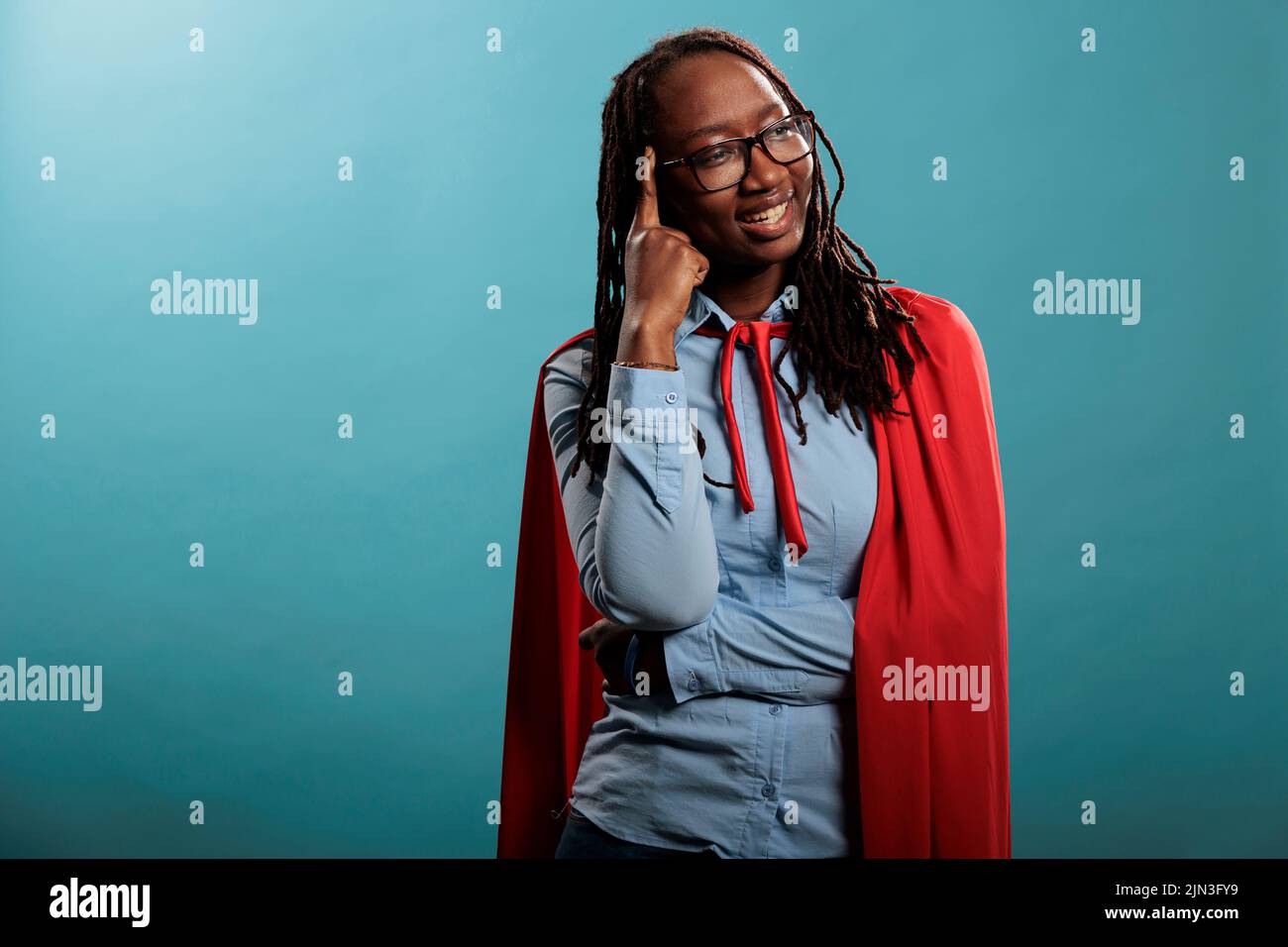 Charming and brave young superhero woman wearing justice defender hero ...