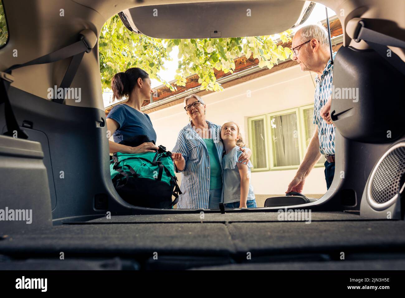 Elderly loading car trunk hi-res stock photography and images - Alamy
