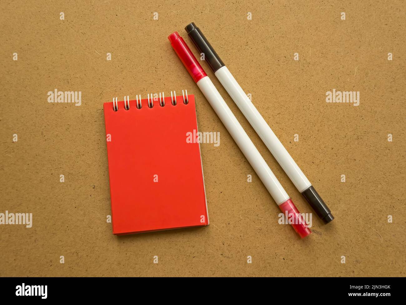 Red notepad for notes with red sheets. Blank space for notes. Mocap ...