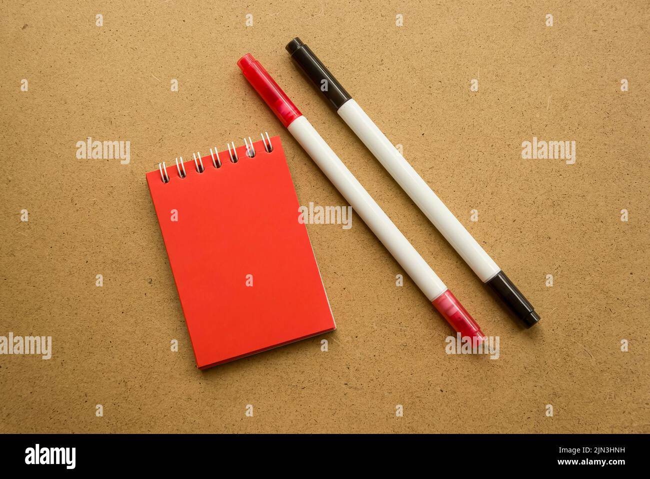 Red notepad for notes with red sheets. Blank space for notes. Mocap ...