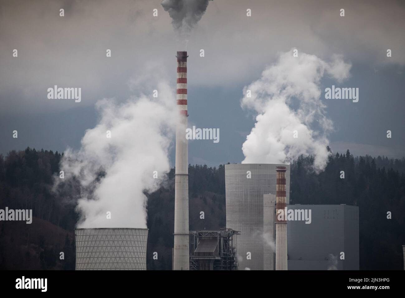 Thermal power plant smoke polluting air and environment Stock Photo - Alamy