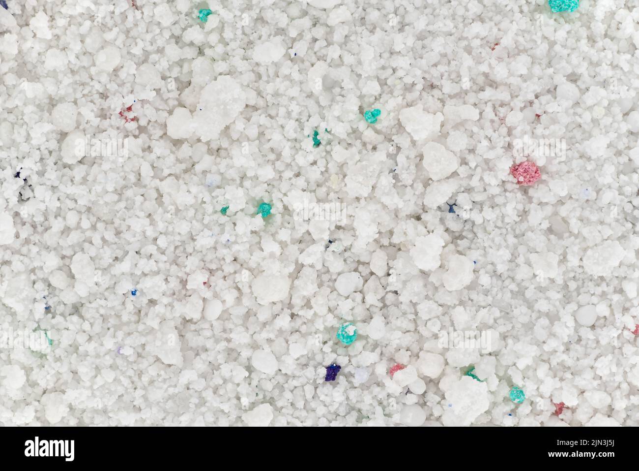 Washing powder under microscope - image width 23mm, colourful granules ...