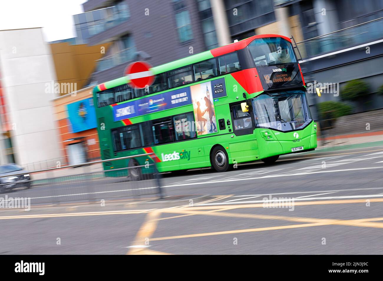 A double decker bus operated by First Bus Company seen passing throug ...