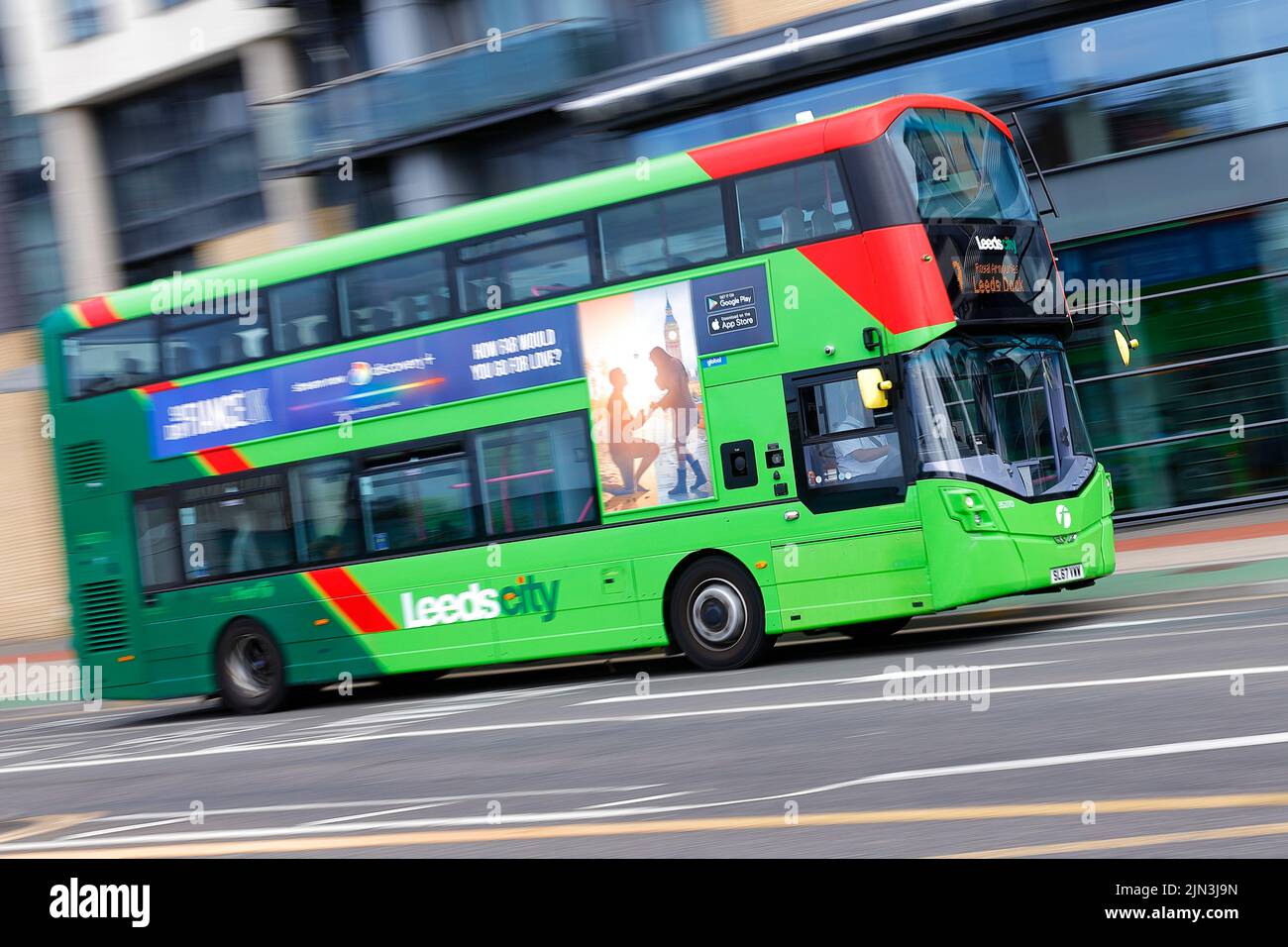 A double decker bus operated by First Bus Company seen passing throug ...